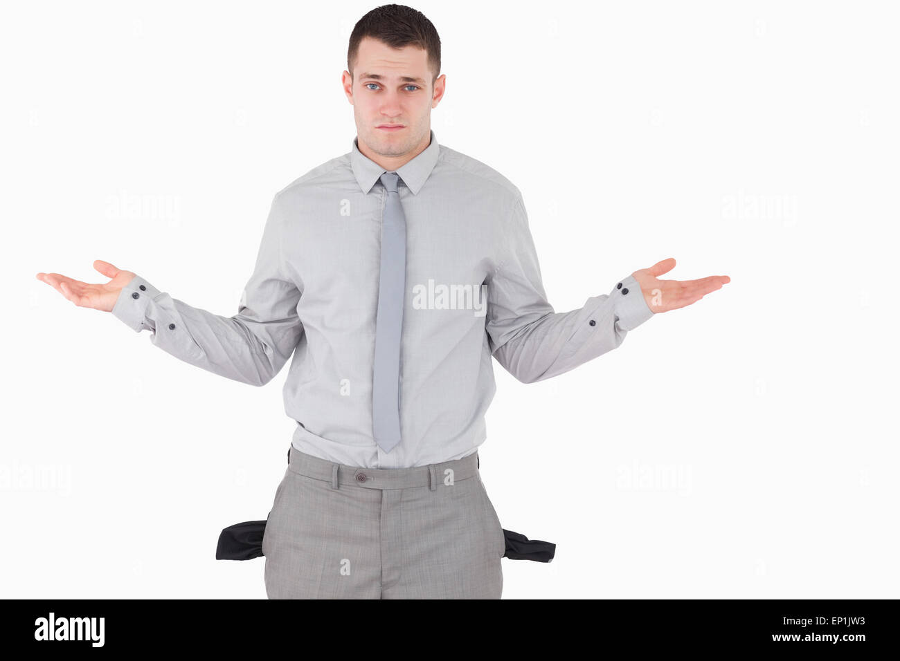 Businessman with empty pockets Stock Photo - Alamy