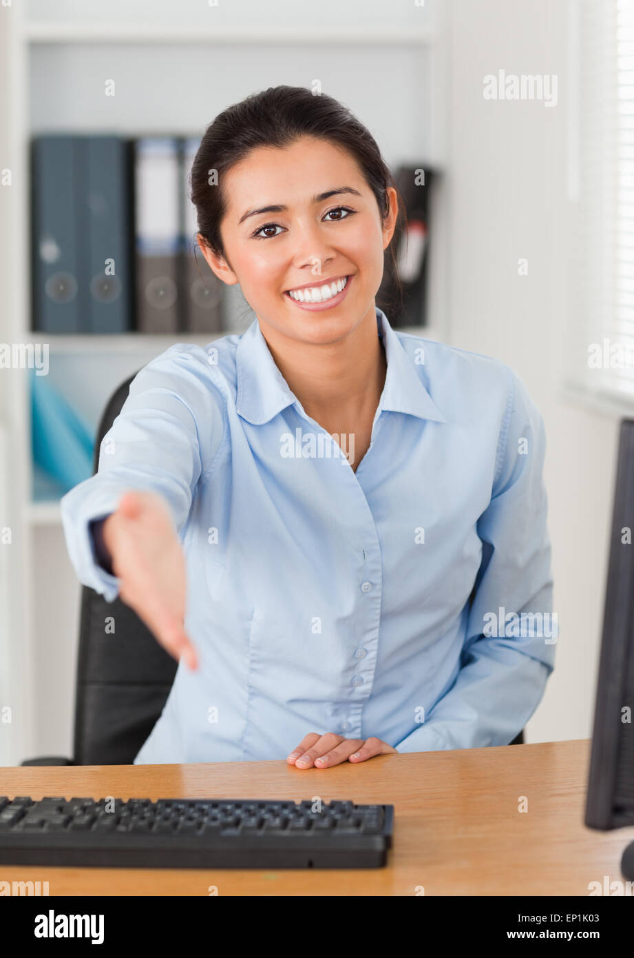 Woman inviting person seat hi-res stock photography and images - Alamy