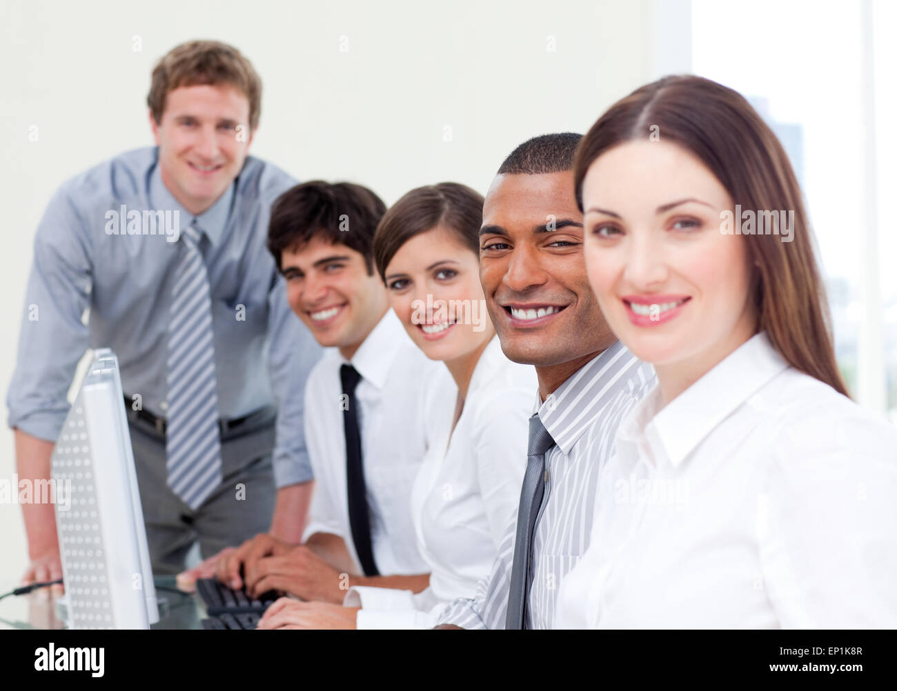 Assertive business team at work Stock Photo - Alamy