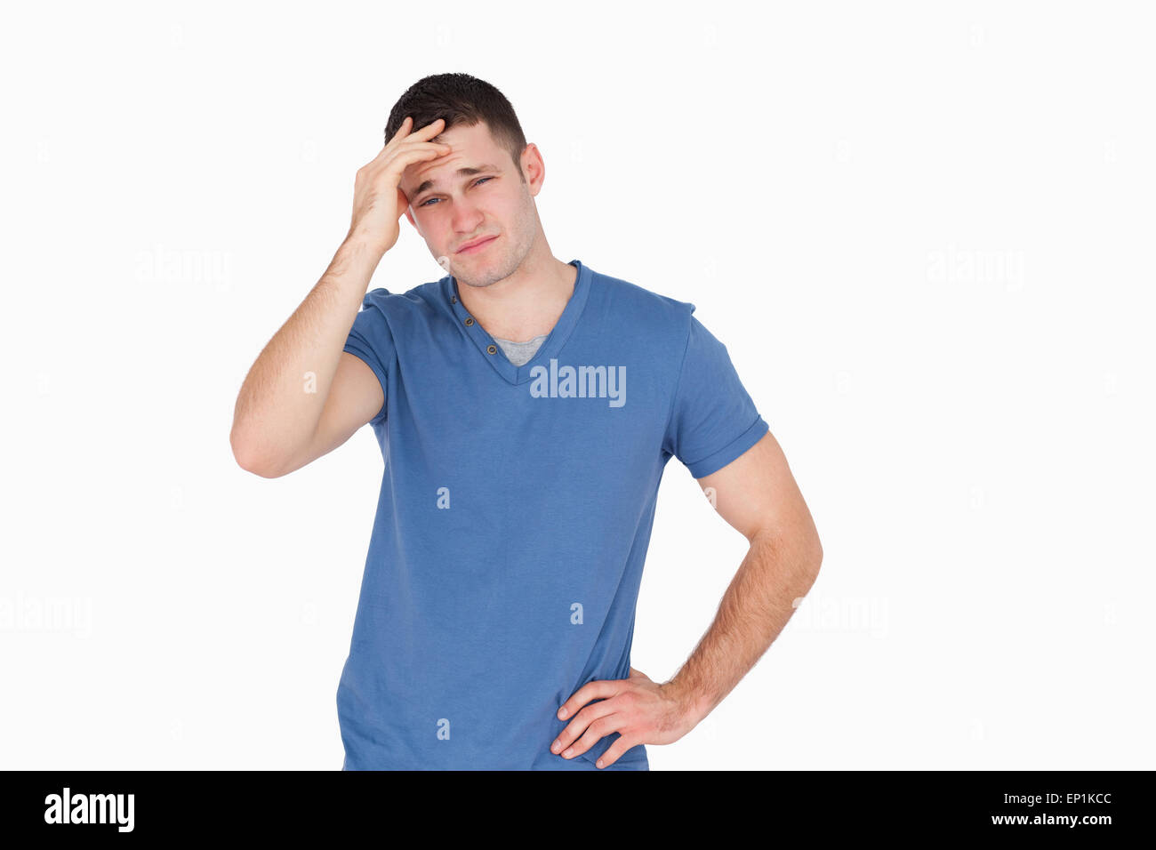 Young man having a headache Stock Photo - Alamy