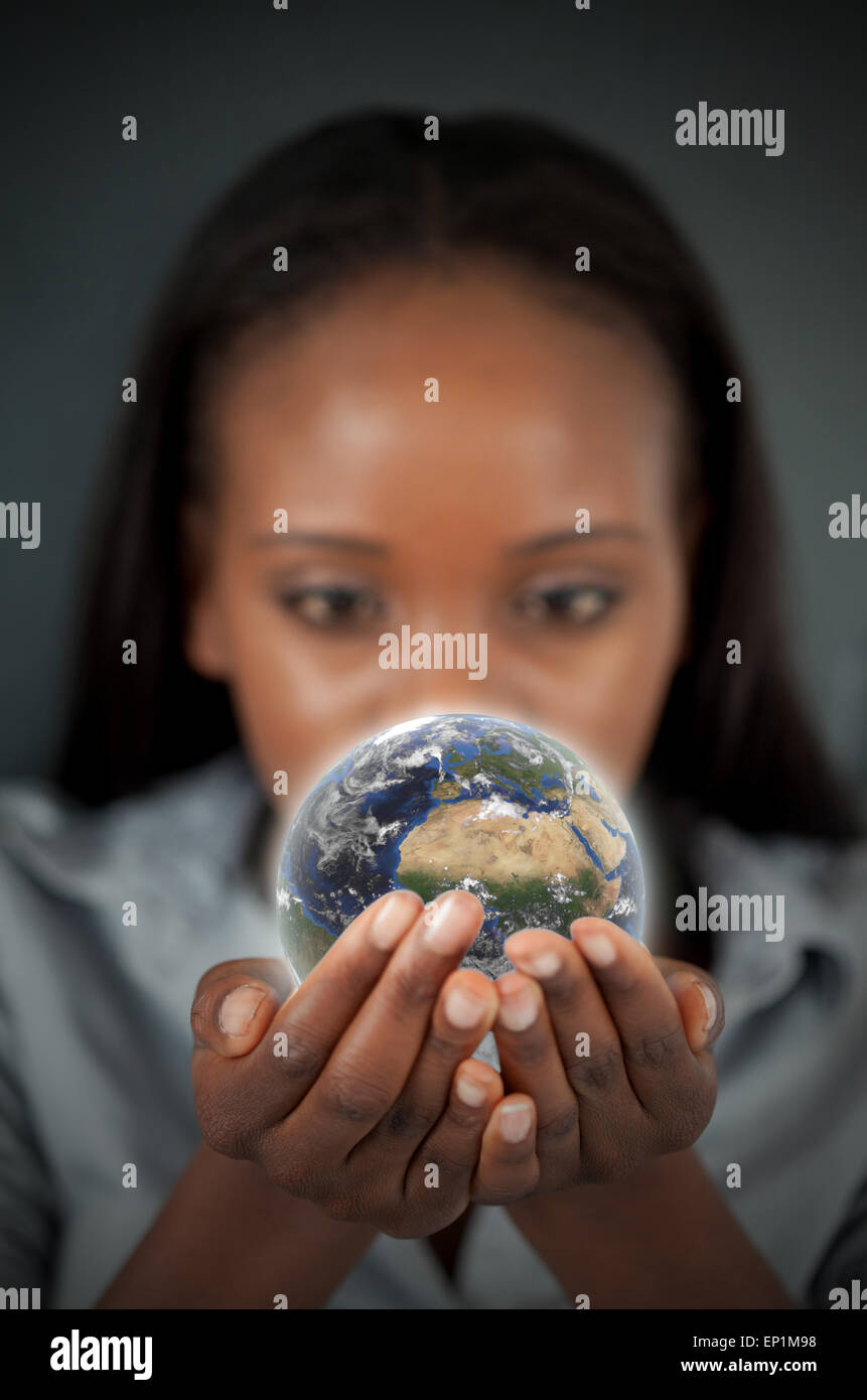 Beautiful woman holding the Earth Stock Photo - Alamy
