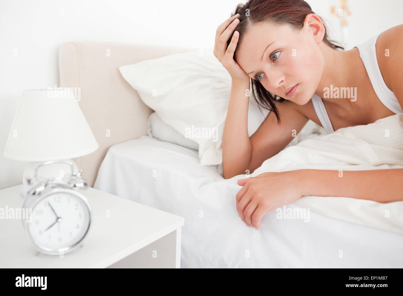 Gorgeous red-haired woman waking up Stock Photo - Alamy
