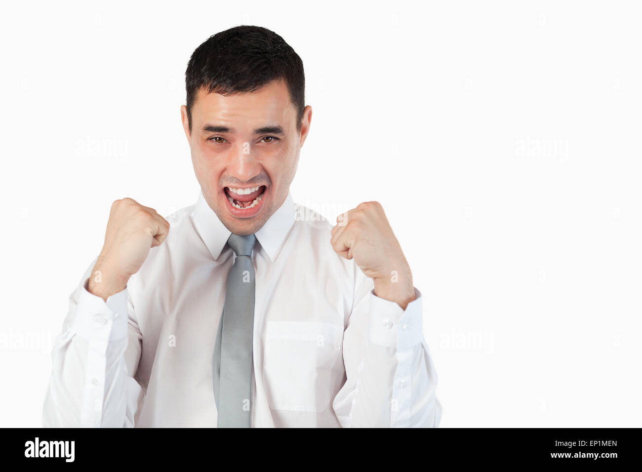 Handsome businessman with the fists up Stock Photo - Alamy