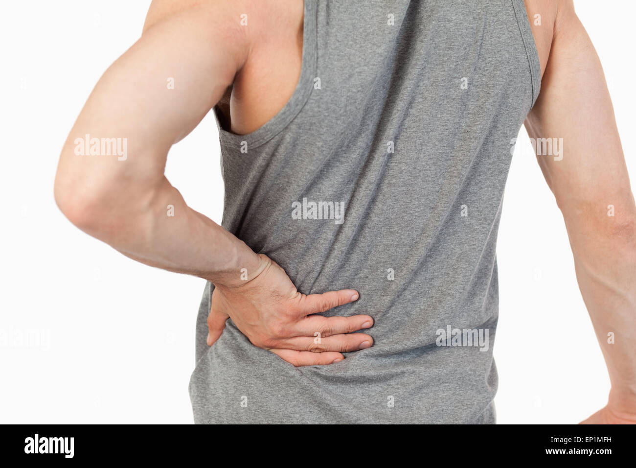 Male hands touching own spine Stock Photo - Alamy