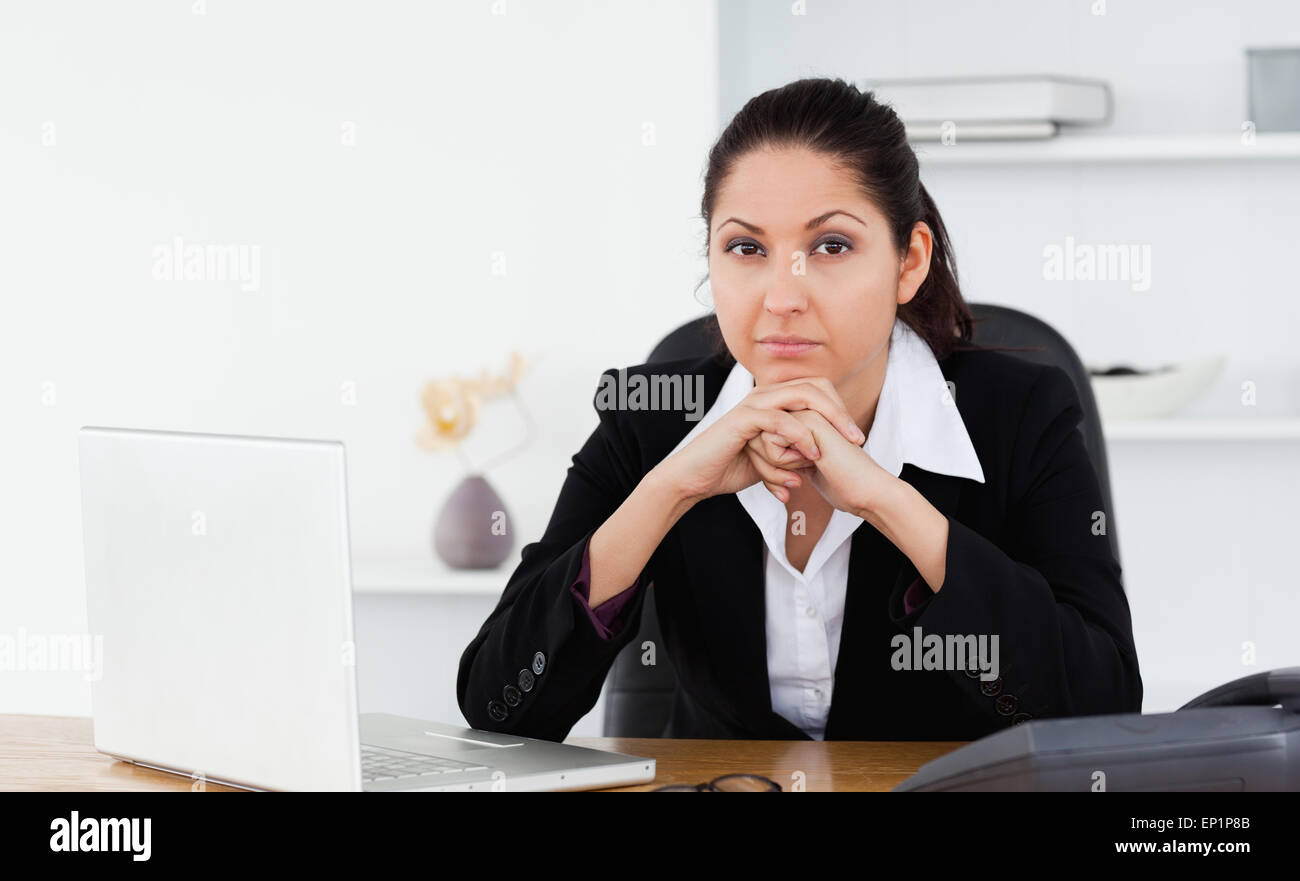 Sad businesswoman at workplace Stock Photo - Alamy