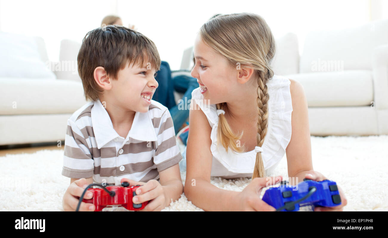 Close-up of children playing video games Stock Photo - Alamy