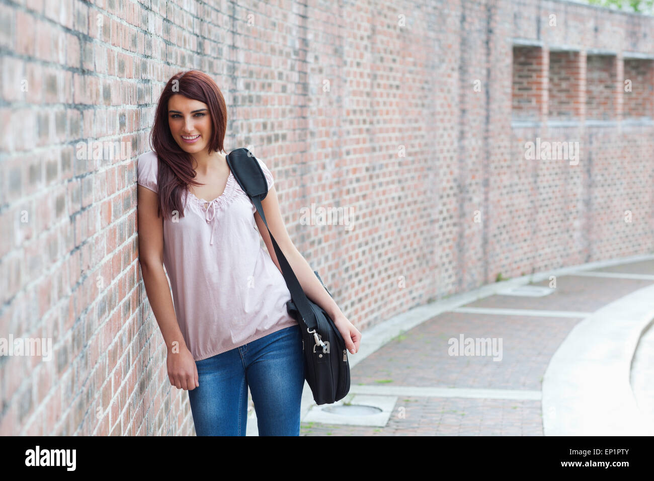Happy student standing up Stock Photo - Alamy