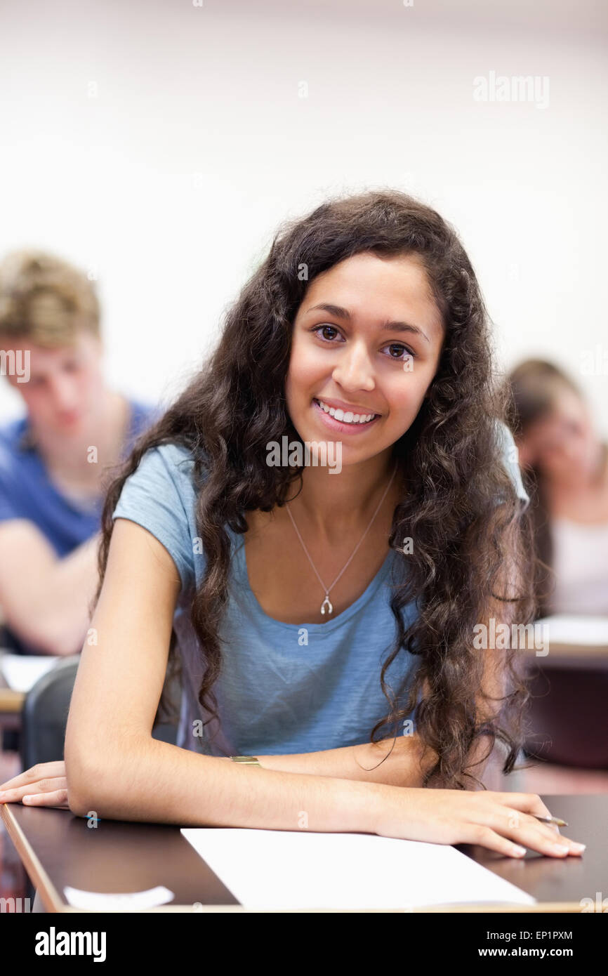 Portrait of a happy student working on an assignment Stock Photo - Alamy
