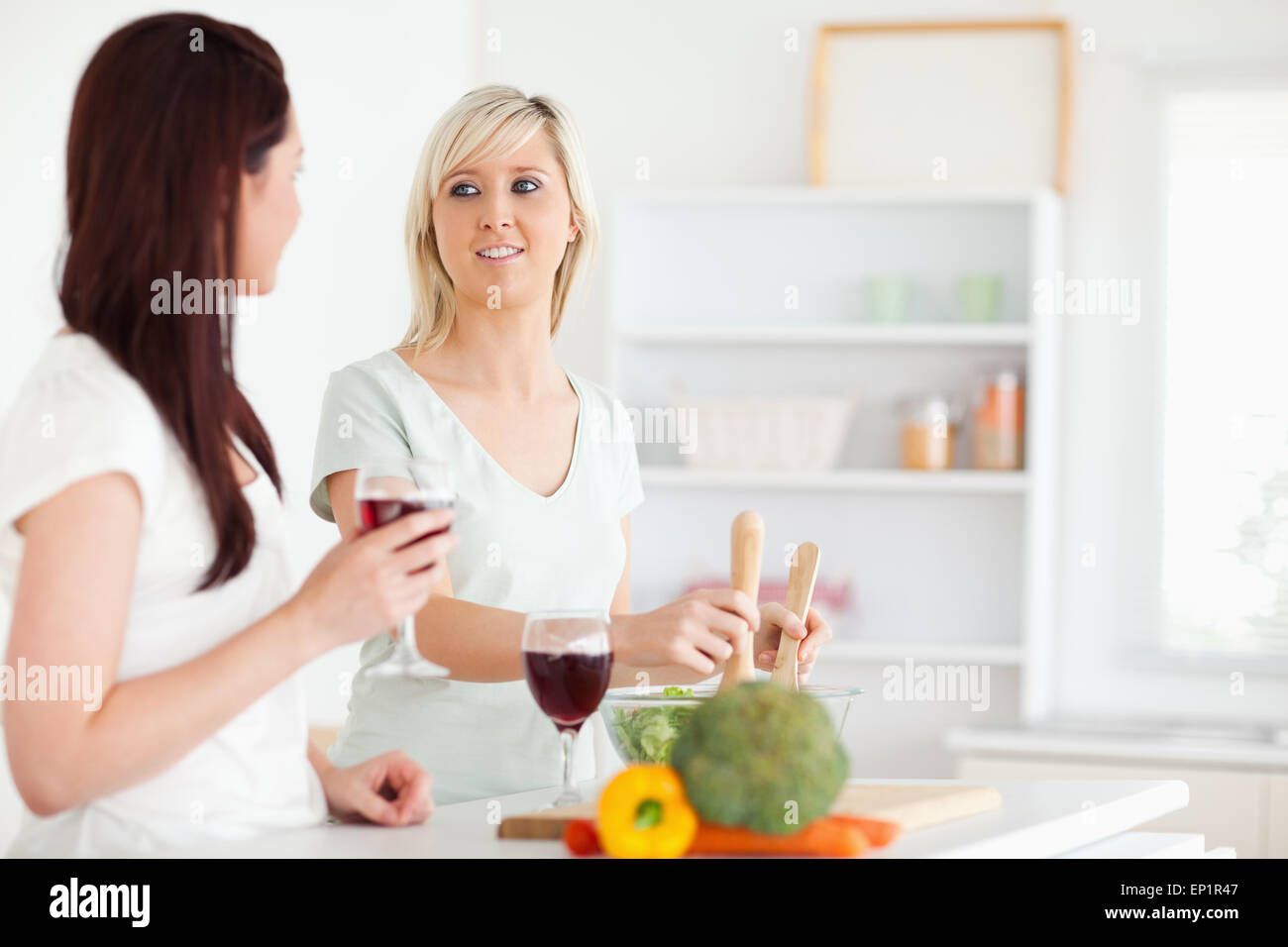 Two women kitchen serious hi-res stock photography and images - Alamy