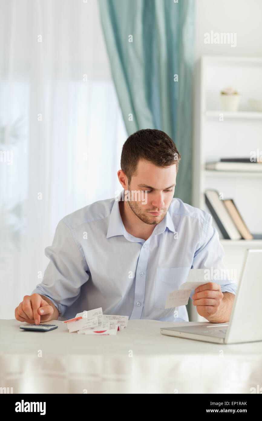 Businessman doing his calculations Stock Photo - Alamy