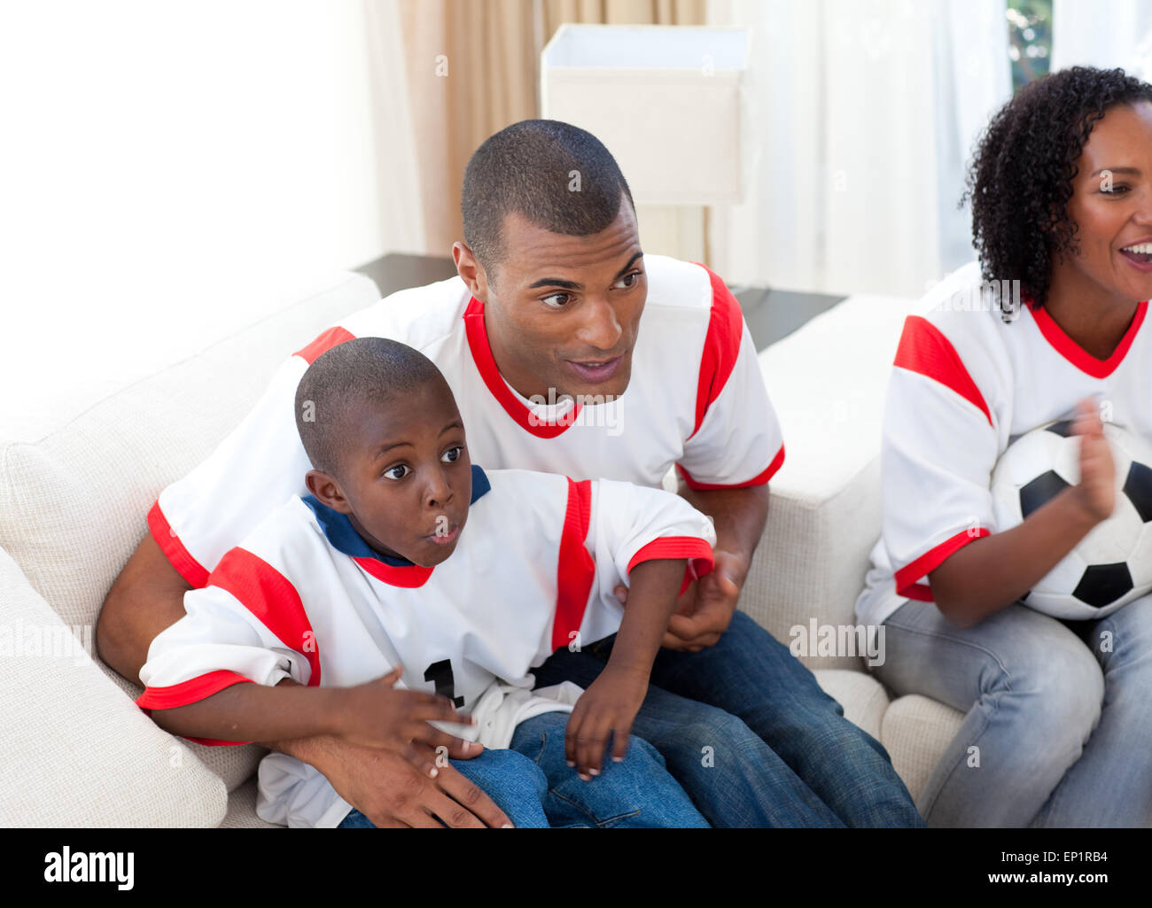 Mom child football game hi-res stock photography and images - Alamy