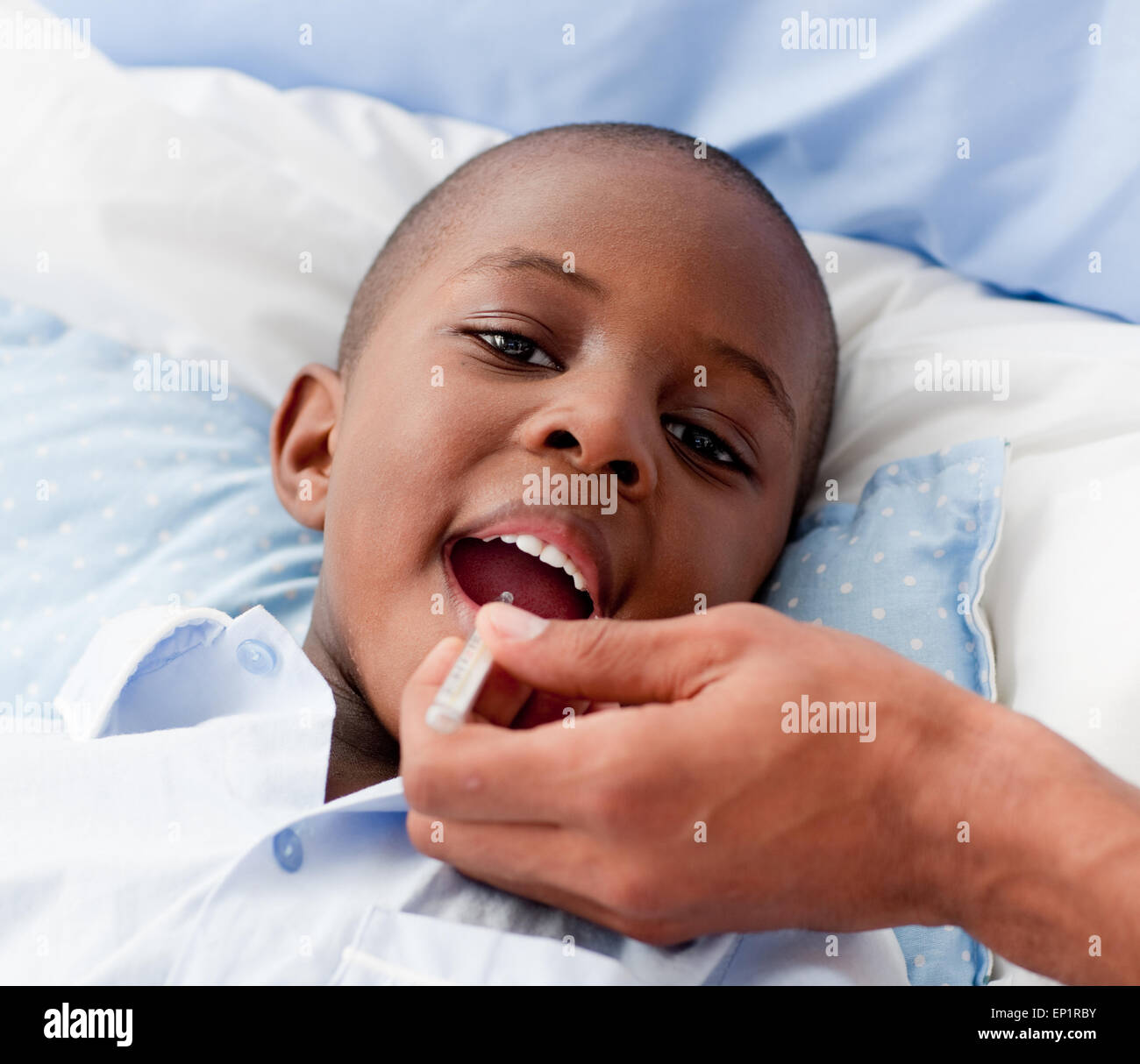 Small Boy sick in bed Stock Photo - Alamy