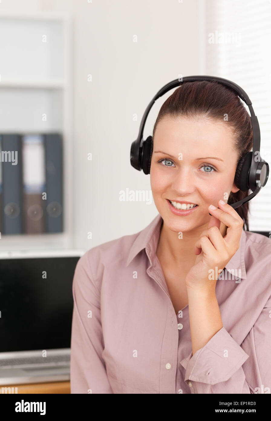 Red-haired woman with headset Stock Photo - Alamy