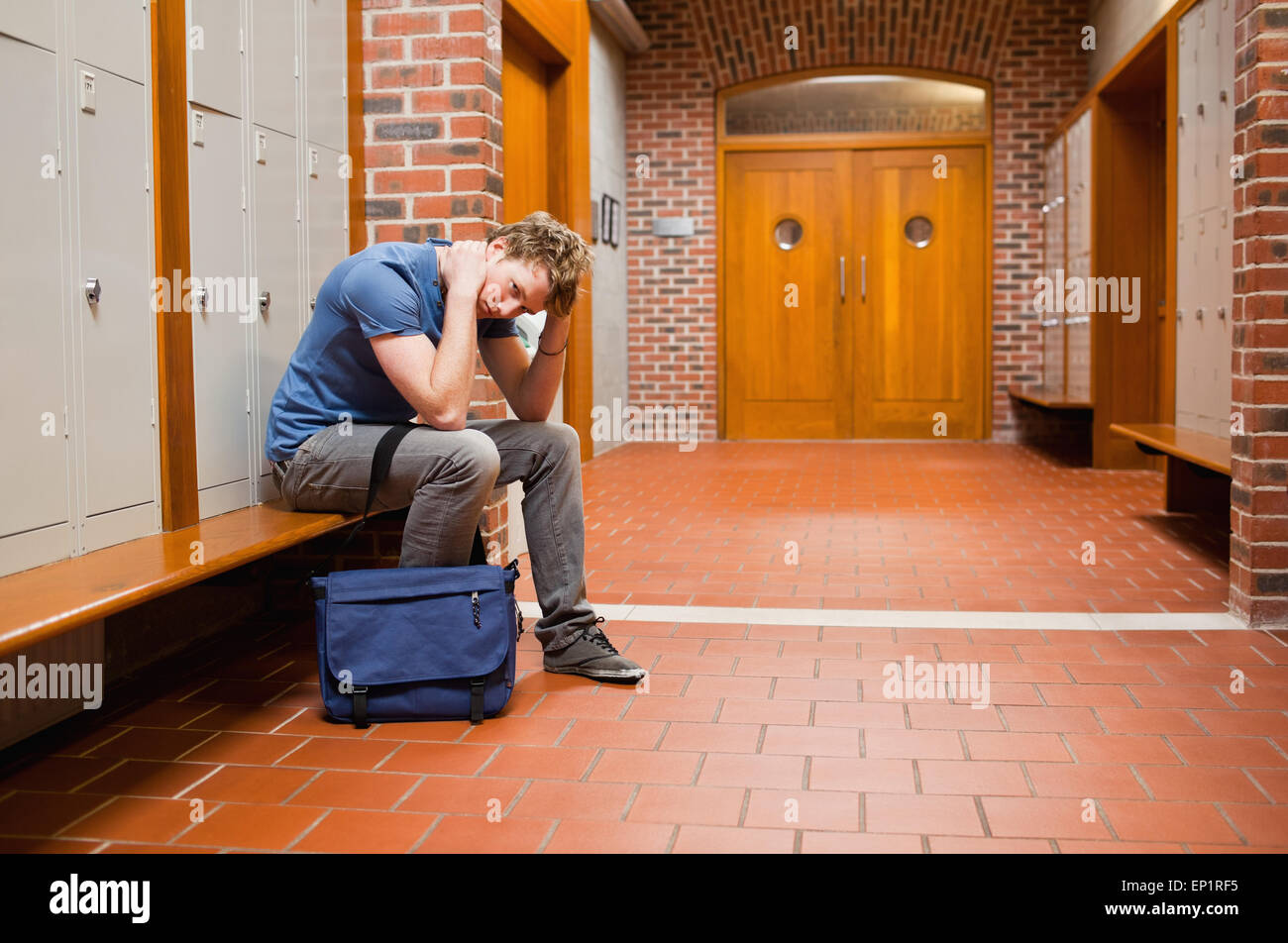 Tired student sitting Stock Photo - Alamy