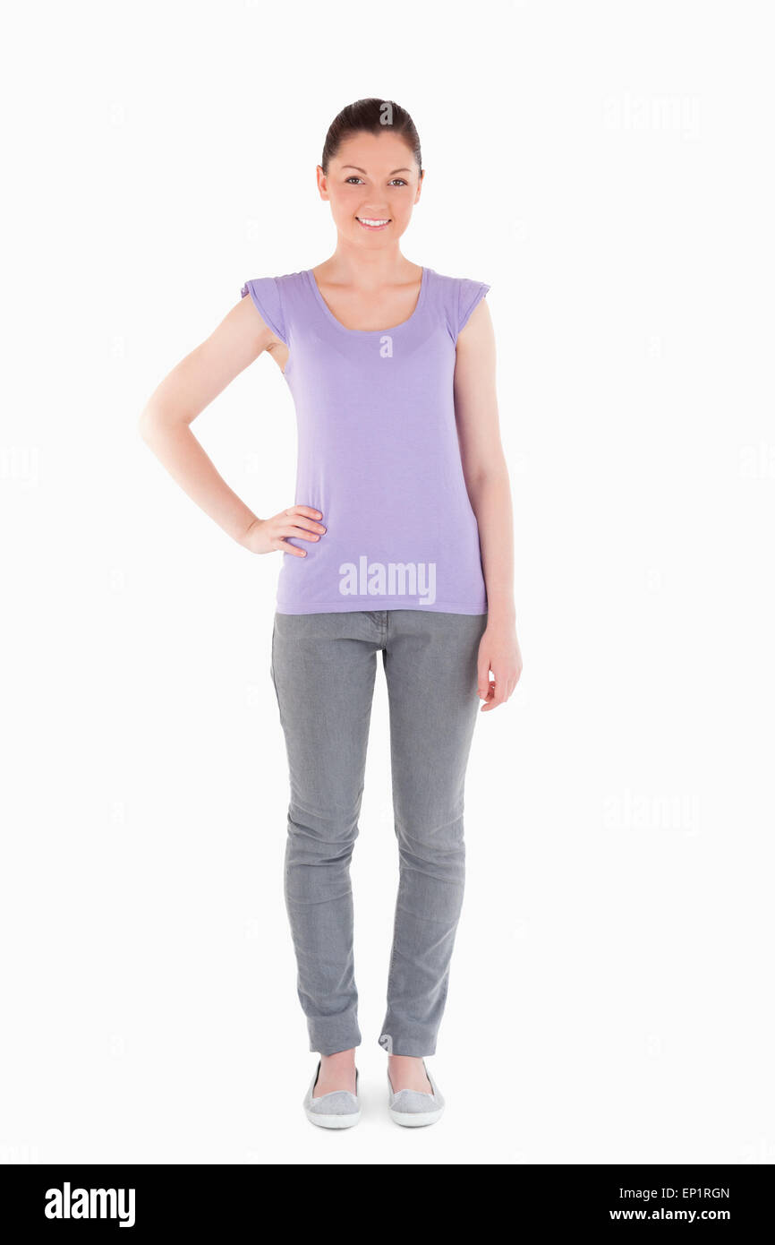Attractive woman posing while standing Stock Photo - Alamy