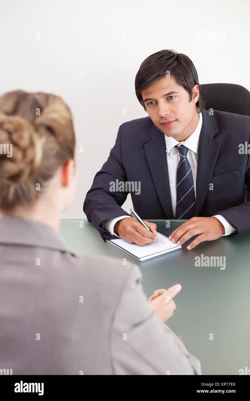 Portrait of a young manager interviewing a female applicant Stock Photo ...