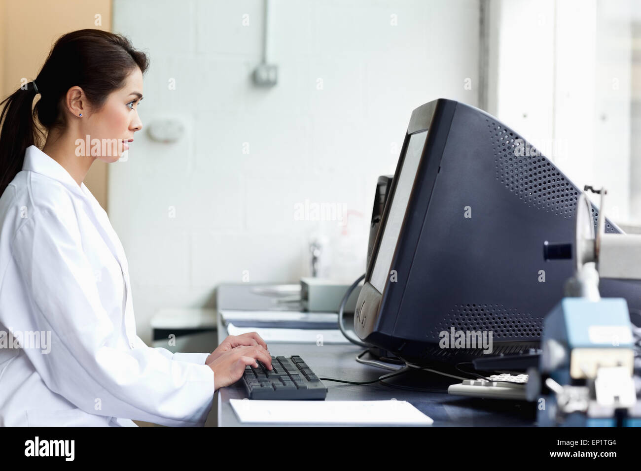 Science student using a monitor Stock Photo - Alamy