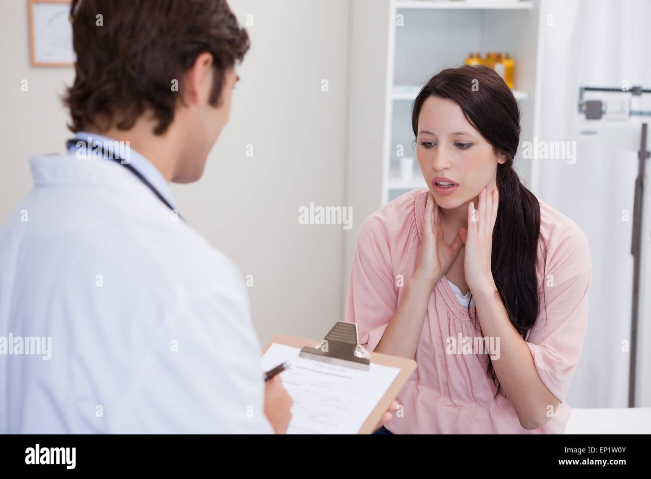 Doctor having conversation with patient Stock Photo - Alamy