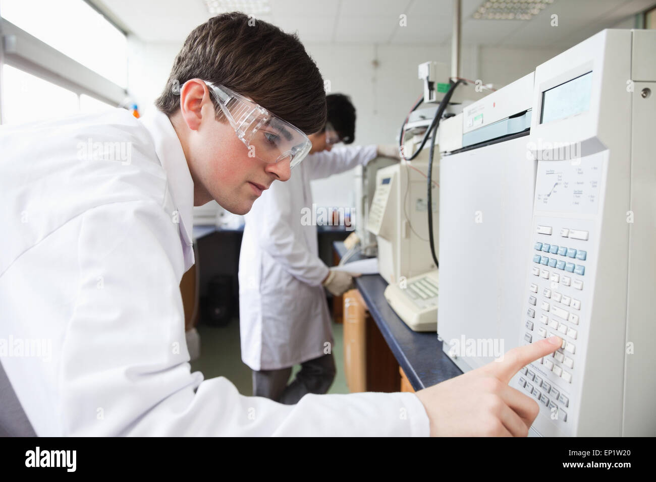 Science student working Stock Photo - Alamy