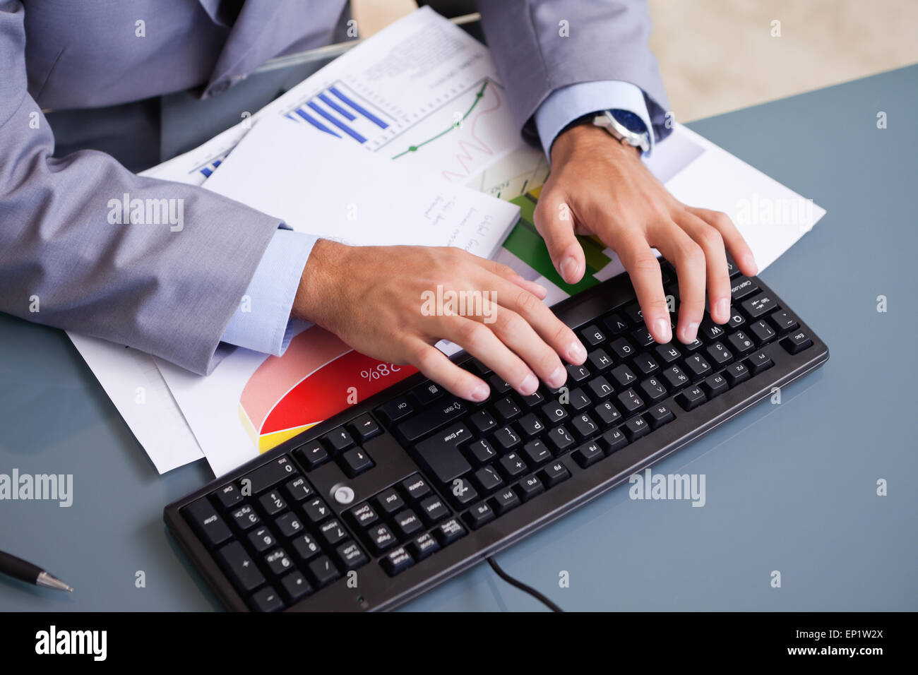 Hands typing on keyboard Stock Photo - Alamy