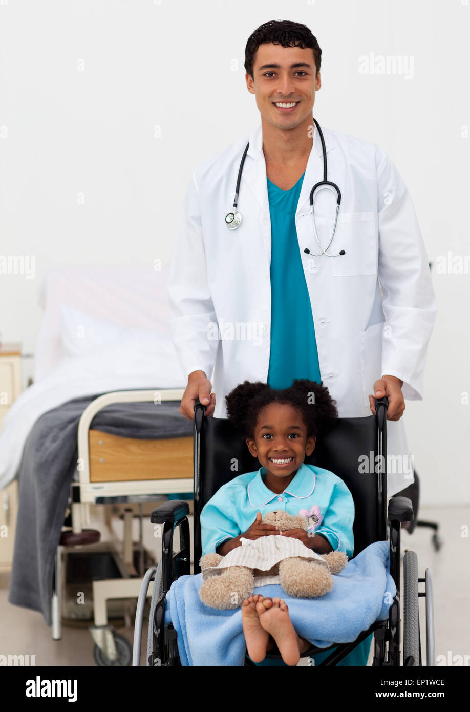 Doctor helping a sick child Stock Photo - Alamy