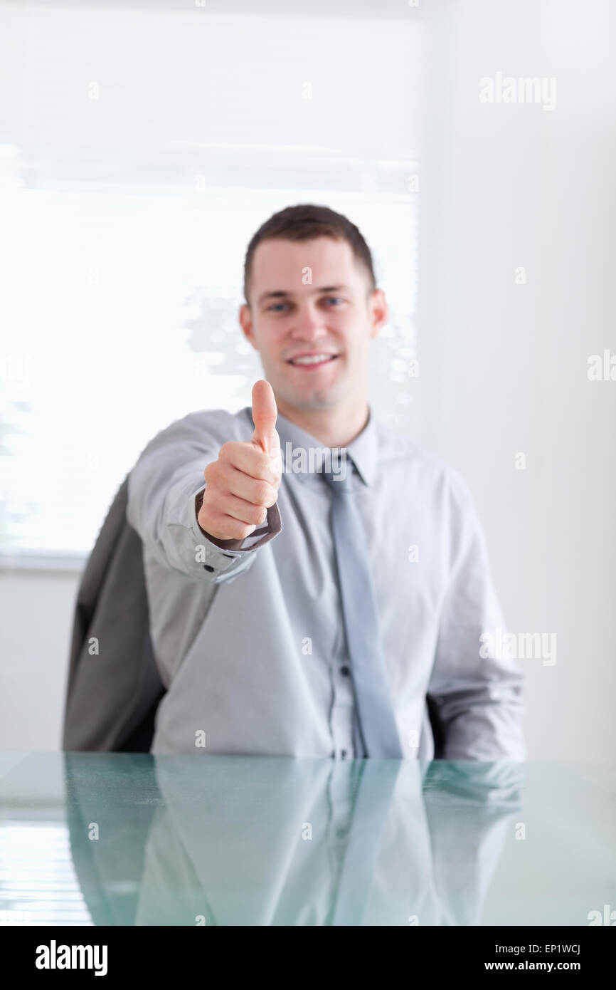 Businessman giving approval Stock Photo - Alamy