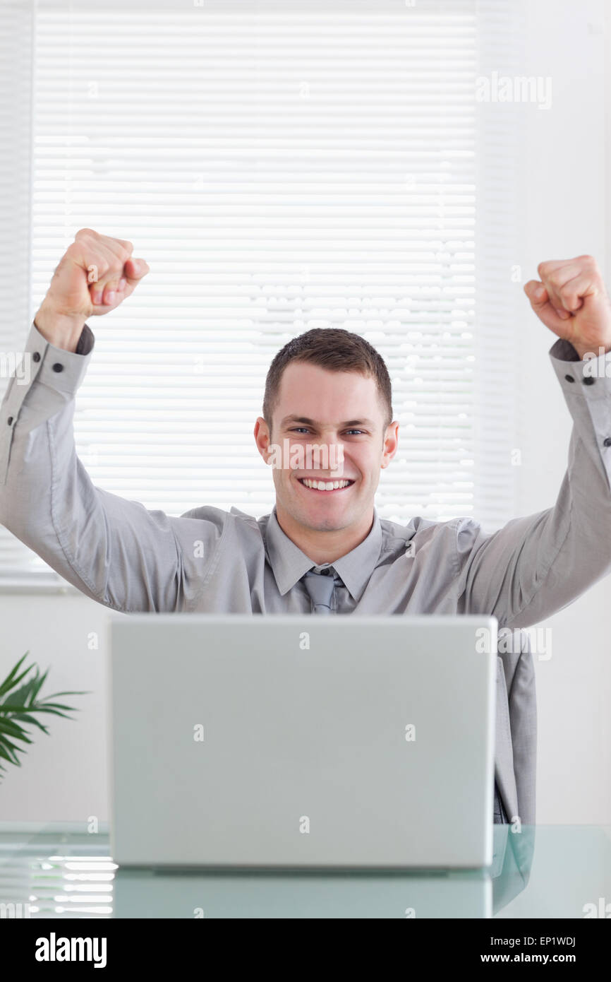 Close up of businessman celebrating a great success Stock Photo - Alamy