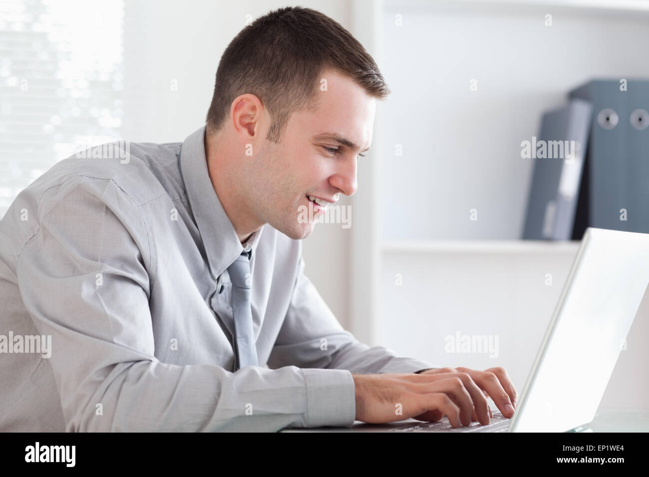 Close up of businessman writing an email with his laptop Stock Photo ...