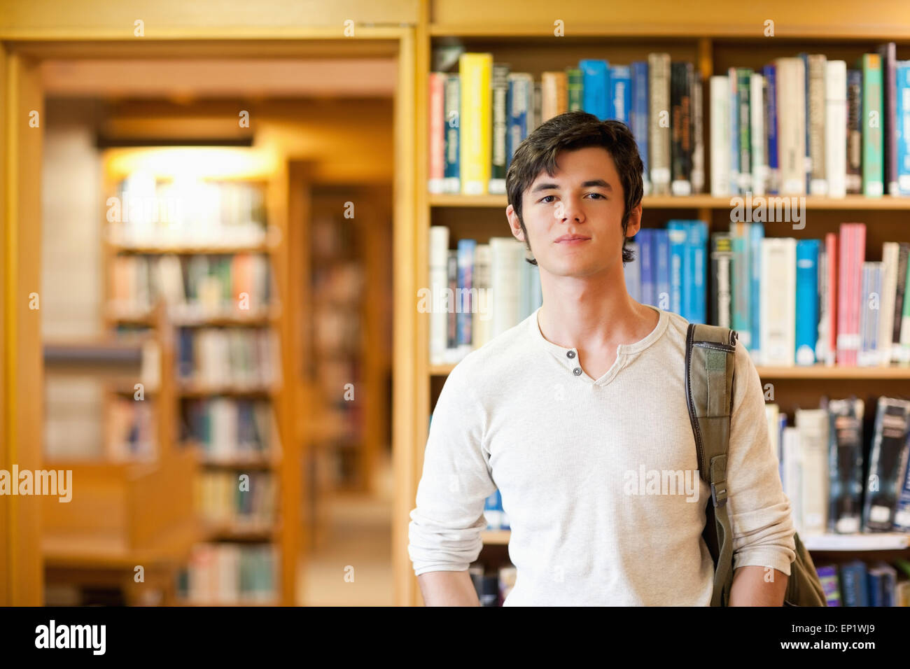 Smiling student standing up Stock Photo - Alamy