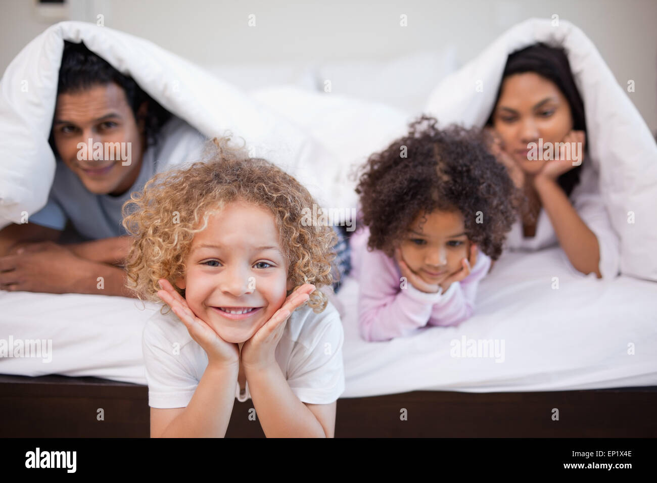 Kids woke their parents Stock Photo - Alamy