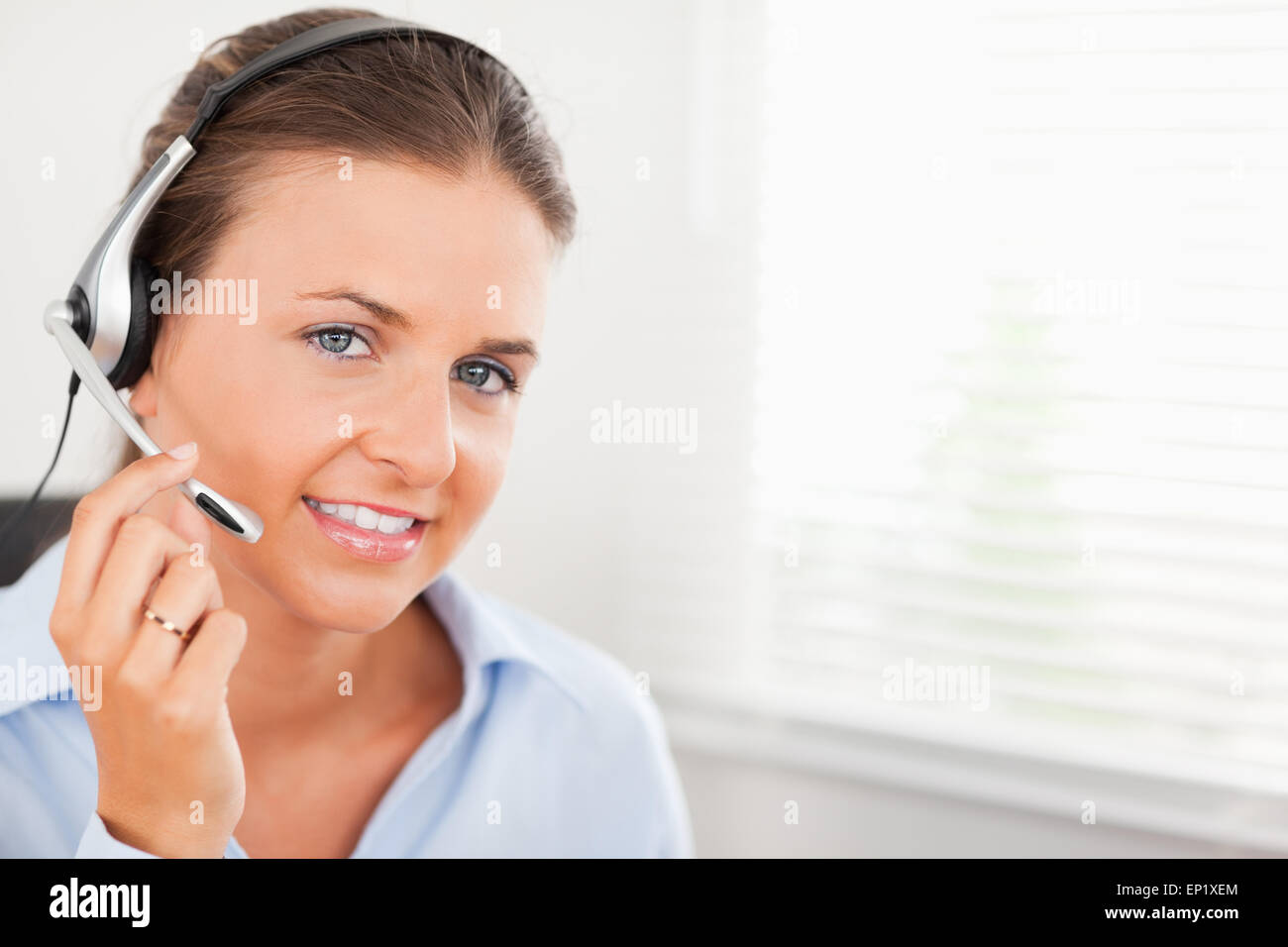 An operator using a headset Stock Photo - Alamy