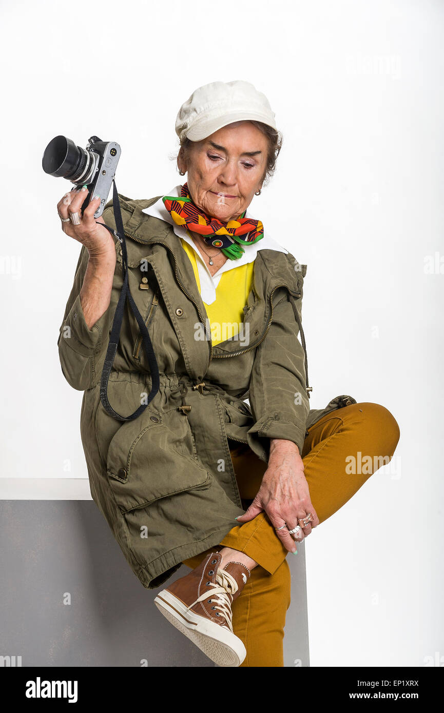 studio portrait of 83 old looking good white senior woman on white ...