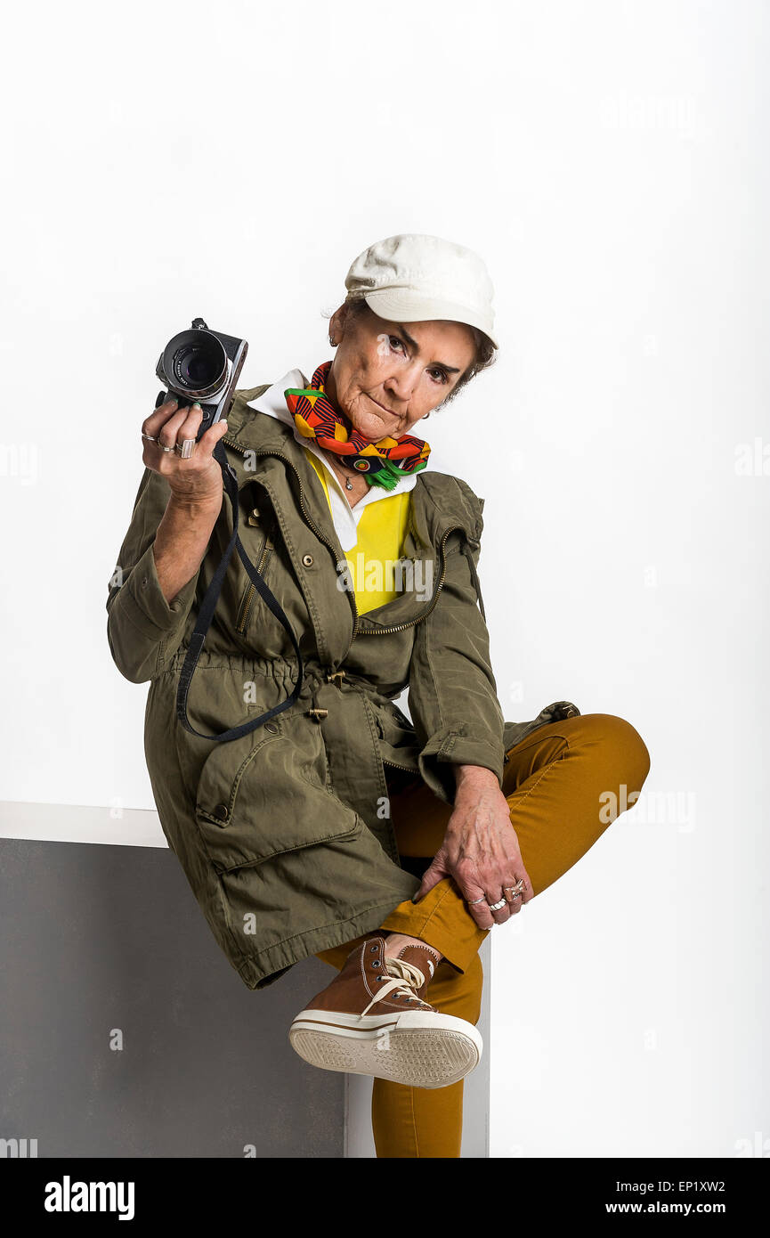 studio portrait of 83 old looking good white senior woman on white ...