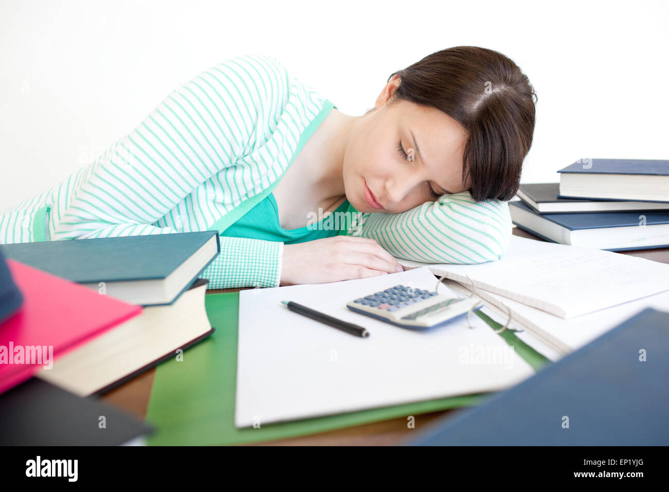 Exhausted student sleeping while studying Stock Photo - Alamy