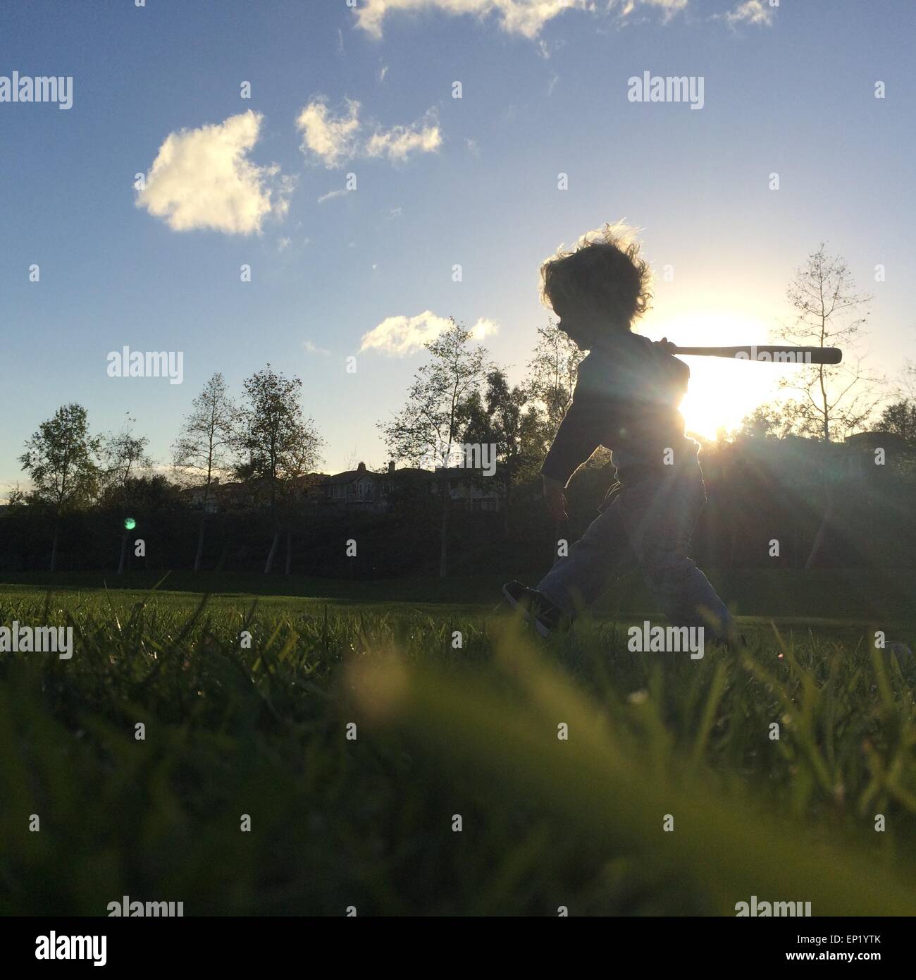 Boy playing baseball hi-res stock photography and images - Alamy