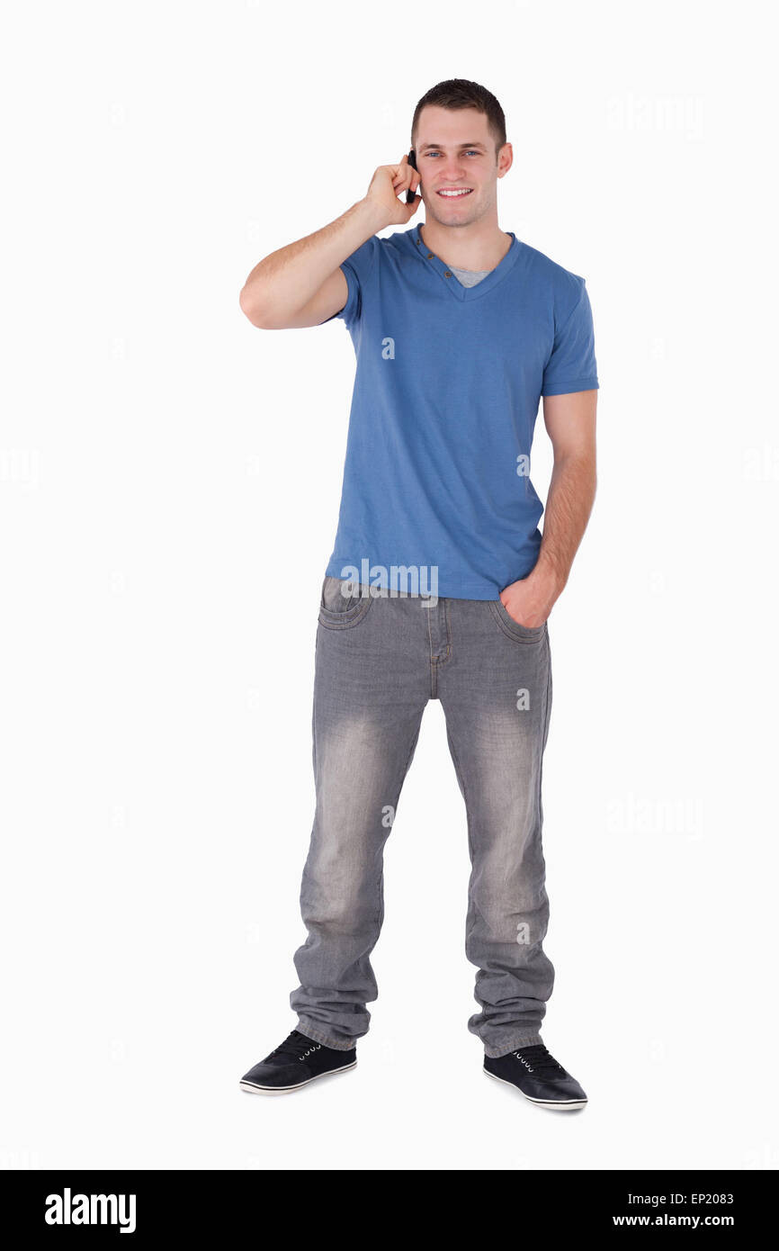 Young man making phone Cut Out Stock Images & Pictures - Alamy