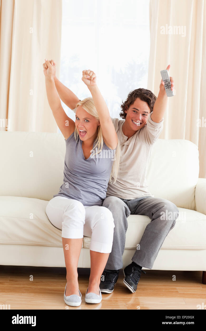 Portrait couple cheering up hi-res stock photography and images - Alamy