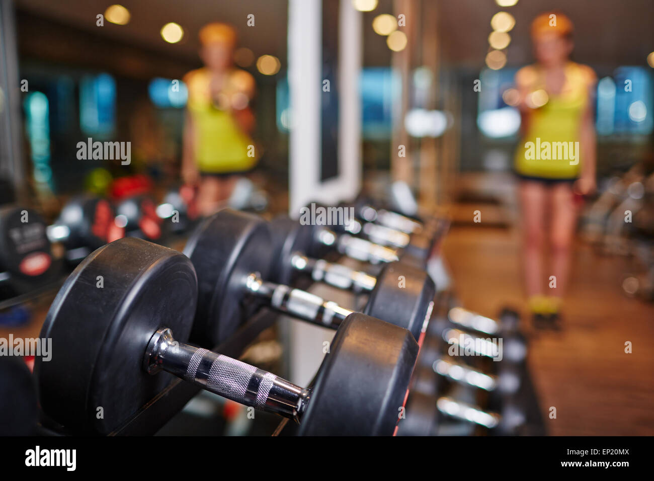 Blur background barbells in gym hi-res stock photography and images - Alamy