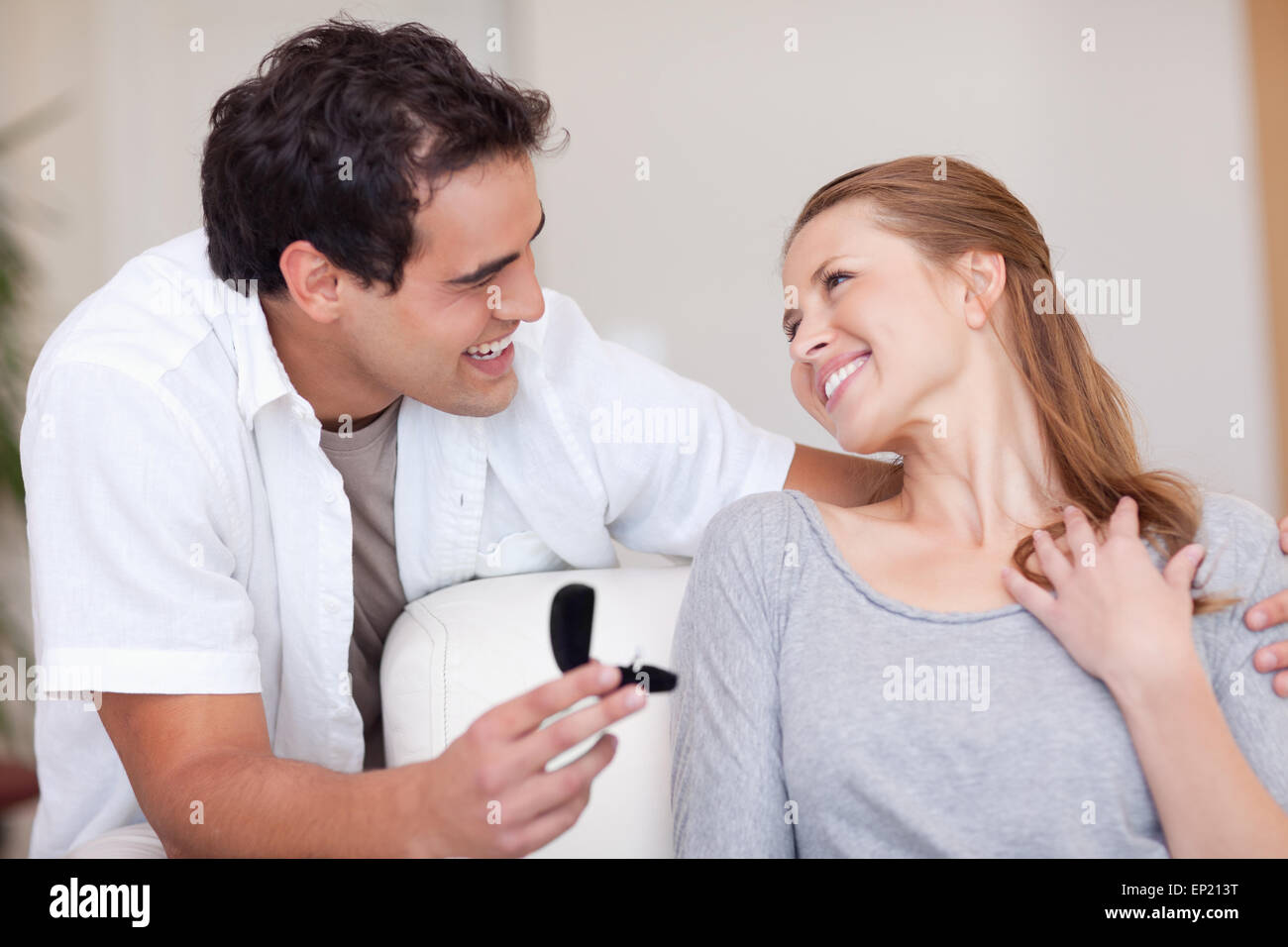 Smiling couple just got engaged Stock Photo - Alamy