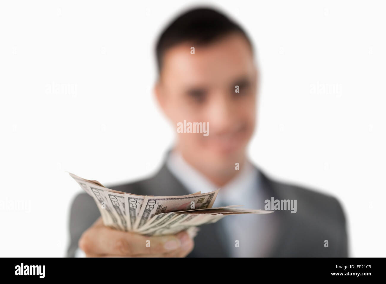Close up of bank notes being held by businessman Stock Photo - Alamy