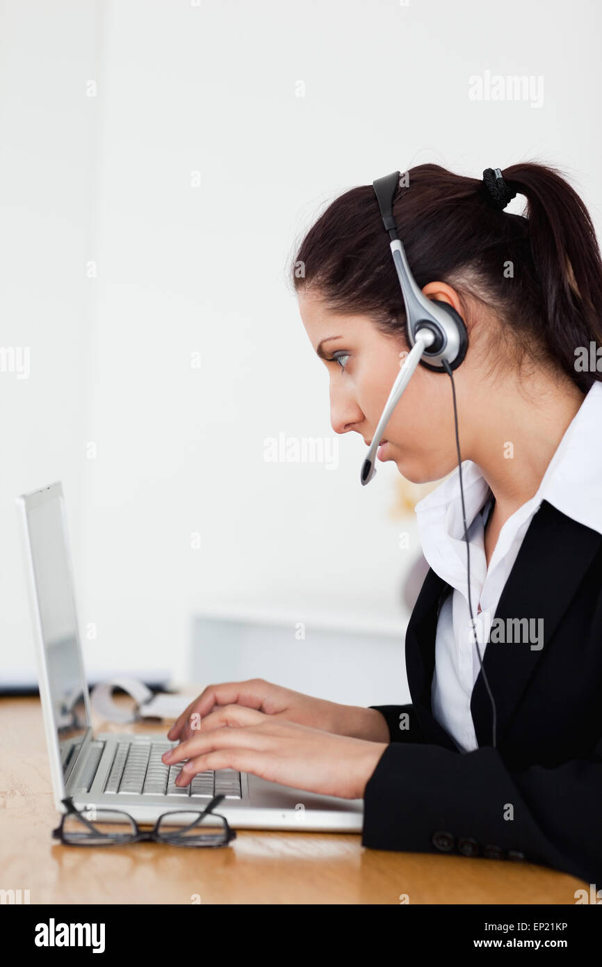 Beautiful operator with a headset Stock Photo - Alamy