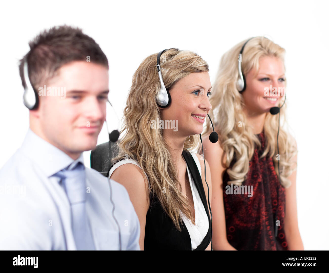 Three people in a call centre Stock Photo - Alamy