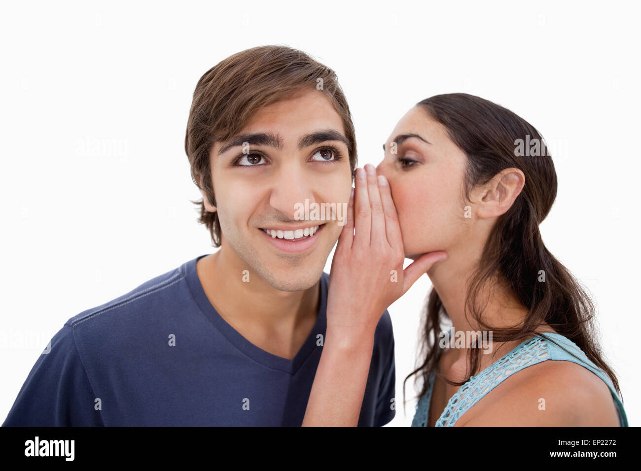 Charming woman whispering something to her fiance Stock Photo - Alamy
