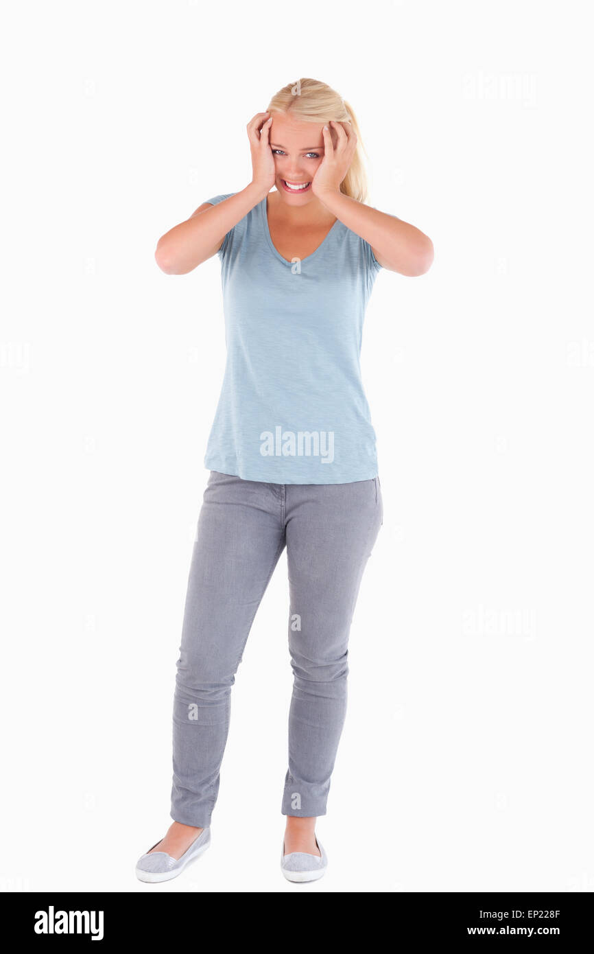 Embarressed blond woman Stock Photo - Alamy