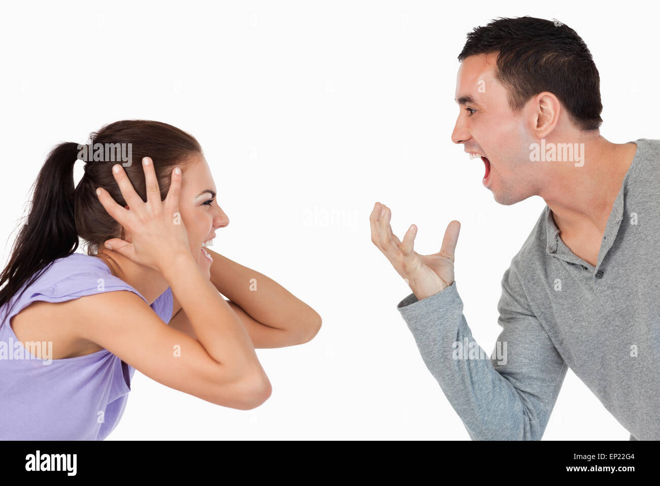 Young couple shouting at each other Stock Photo - Alamy