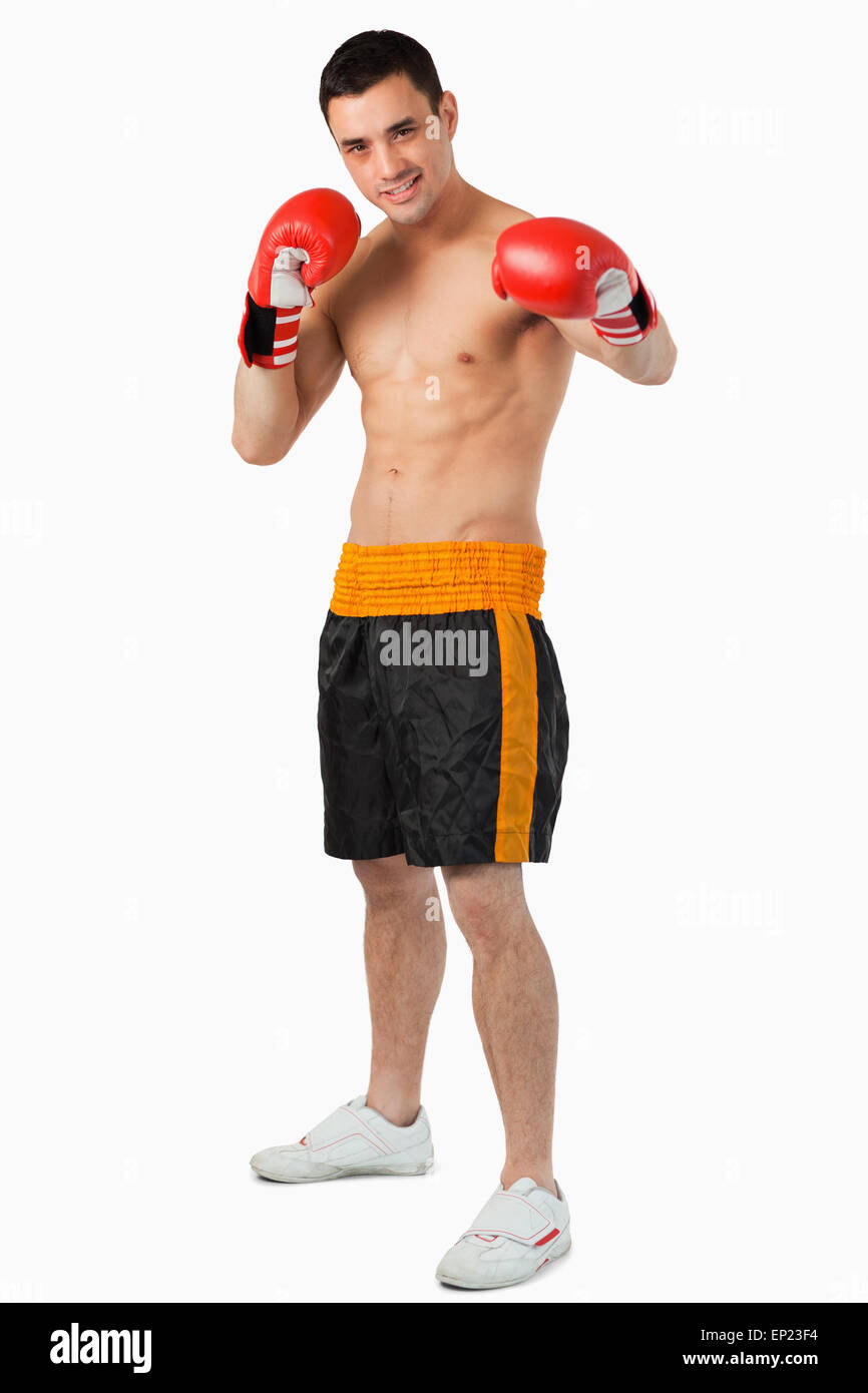 Young boxer performing a left hook Stock Photo - Alamy