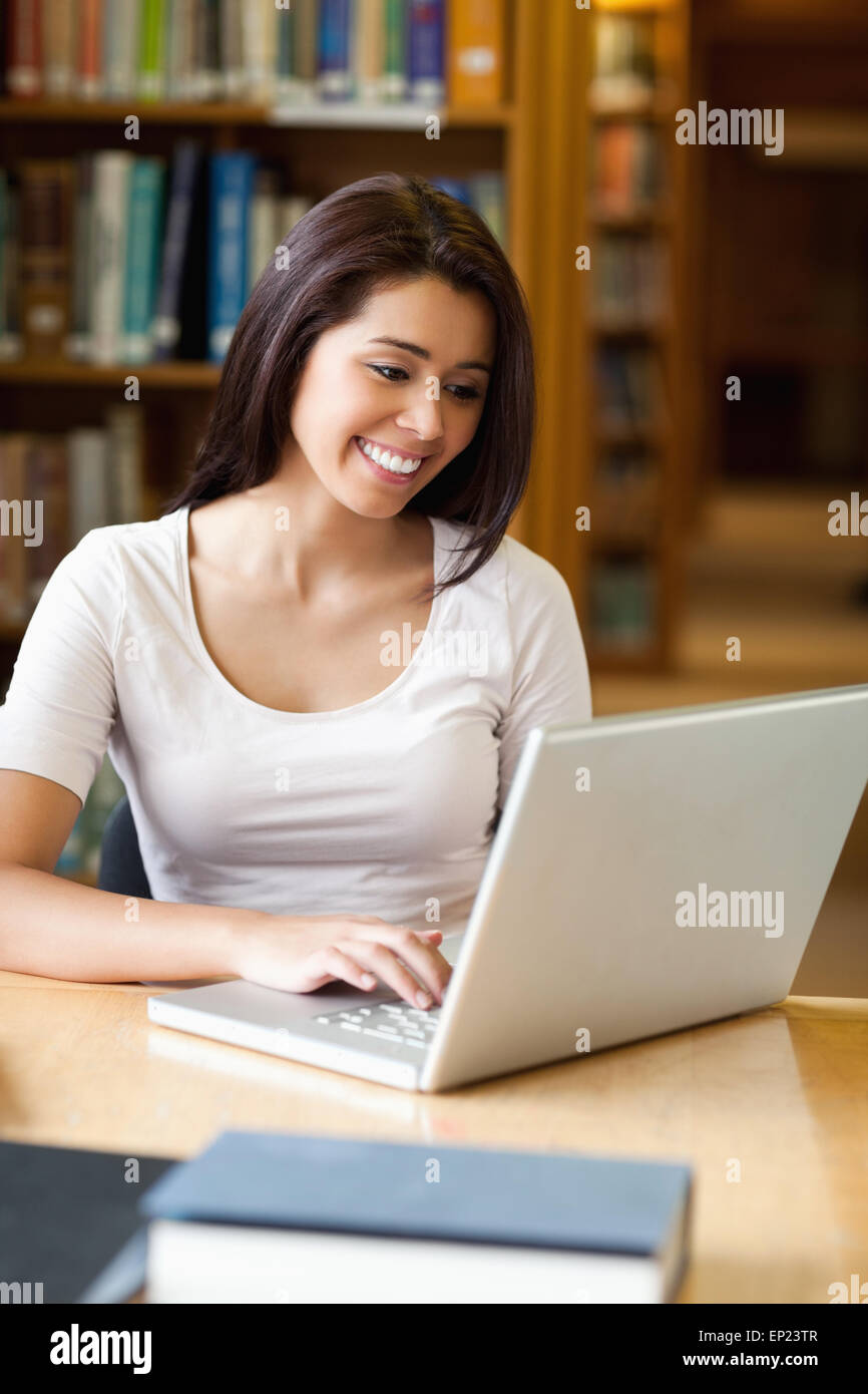 Portrait of a student working with a laptop Stock Photo - Alamy