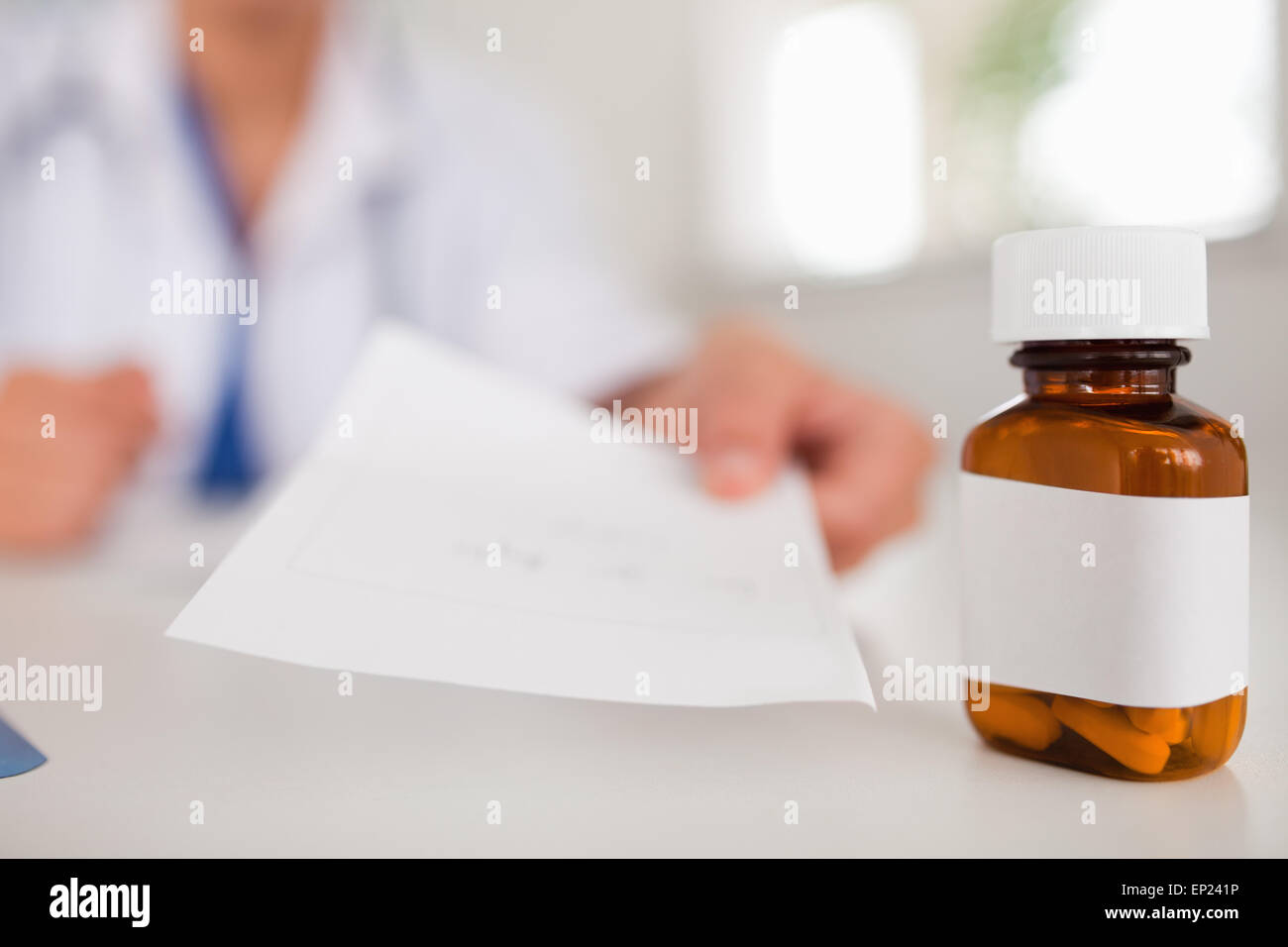 Female doctor showing paper Stock Photo - Alamy