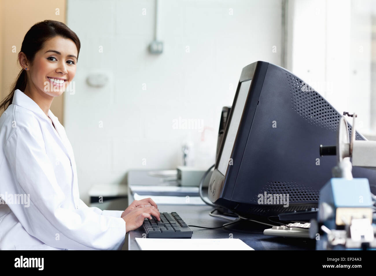 Science student with a monitor Stock Photo - Alamy