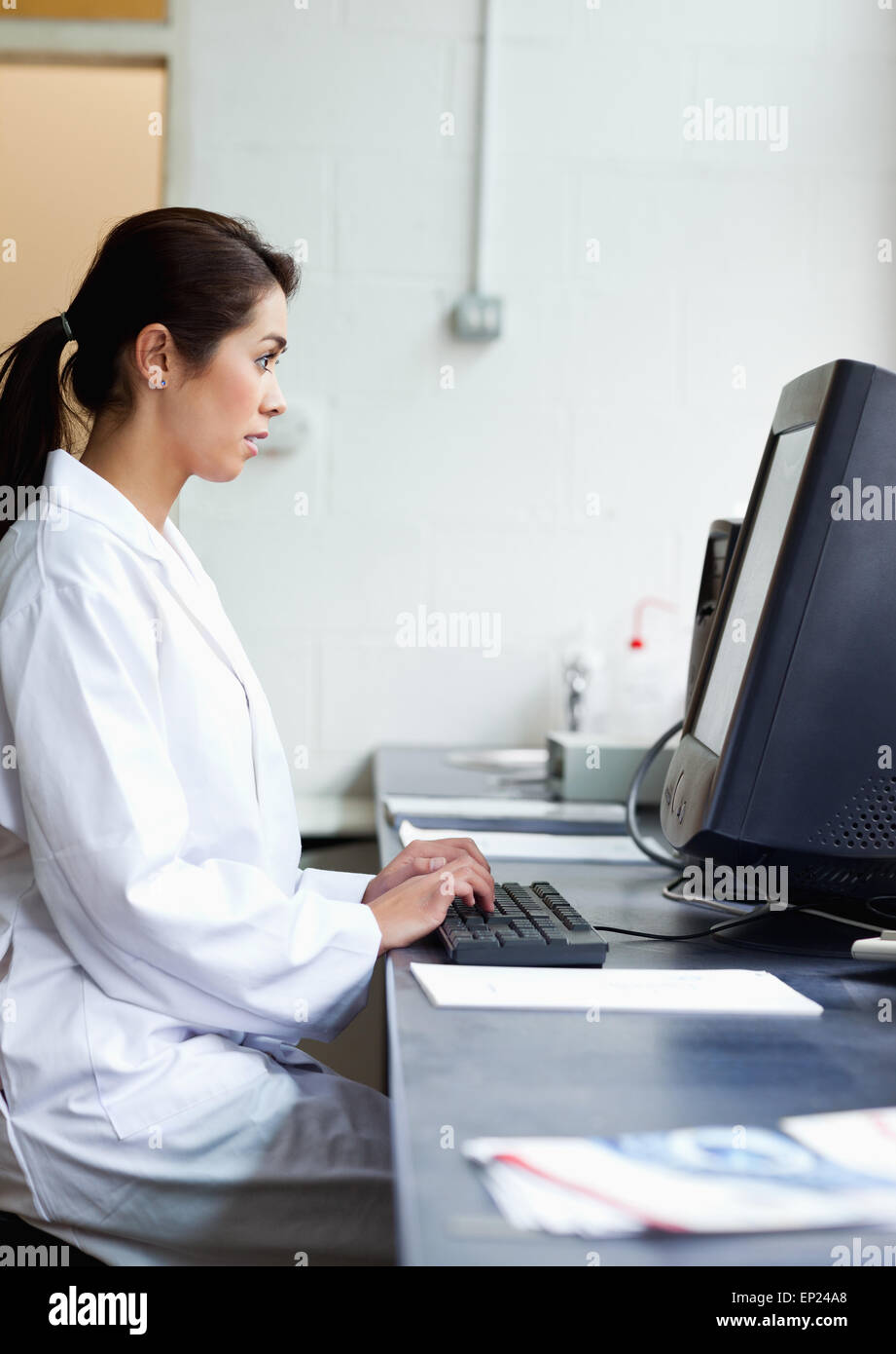 Portrait of a science student using a monitor Stock Photo - Alamy